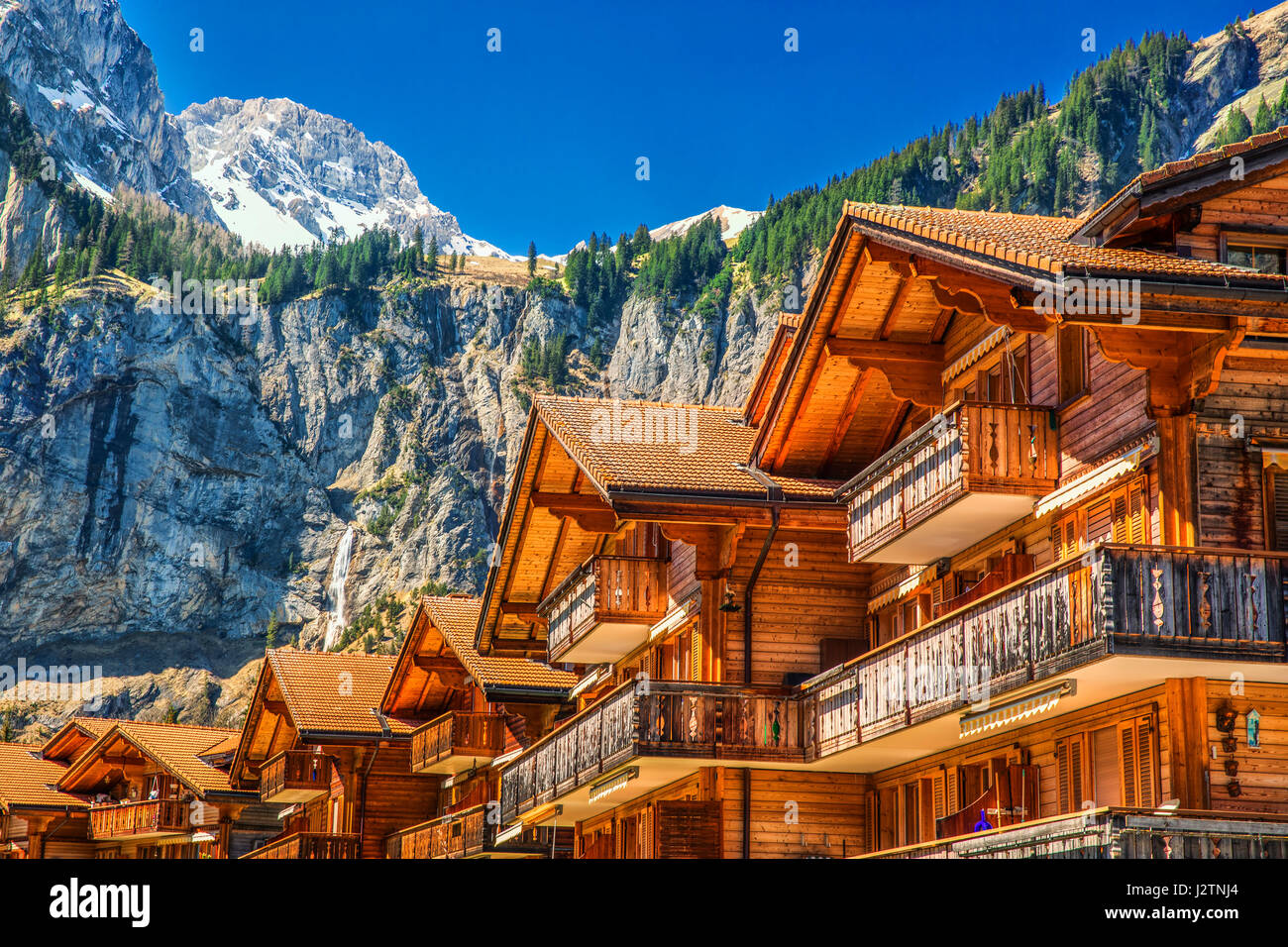 KANDERSTEGG, SWITZERLAND - April 2017 - Colorful wooden houses with ...