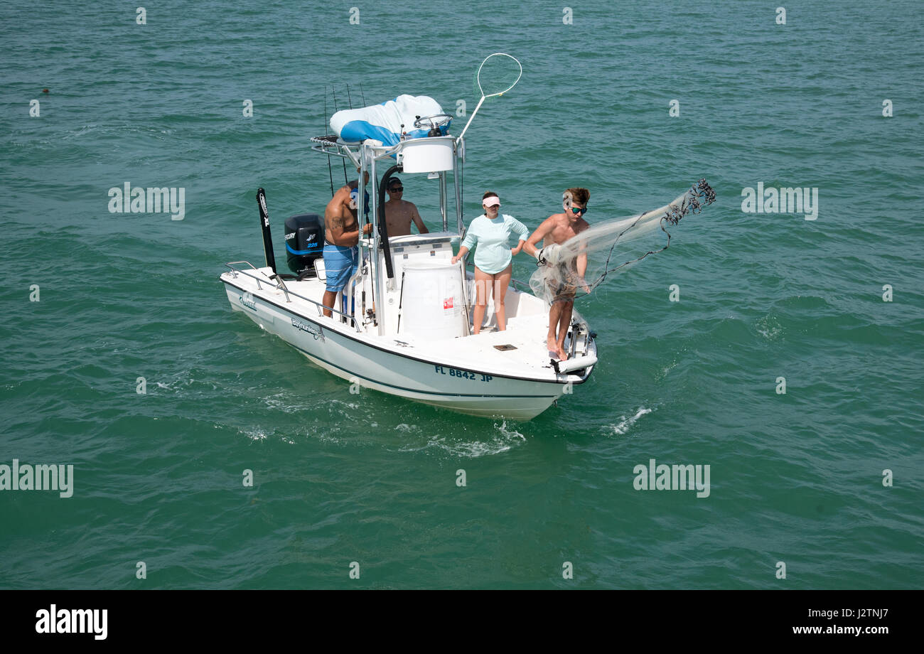 Fishing for bait using a cast net on the Gulf of Mexico Southern ...