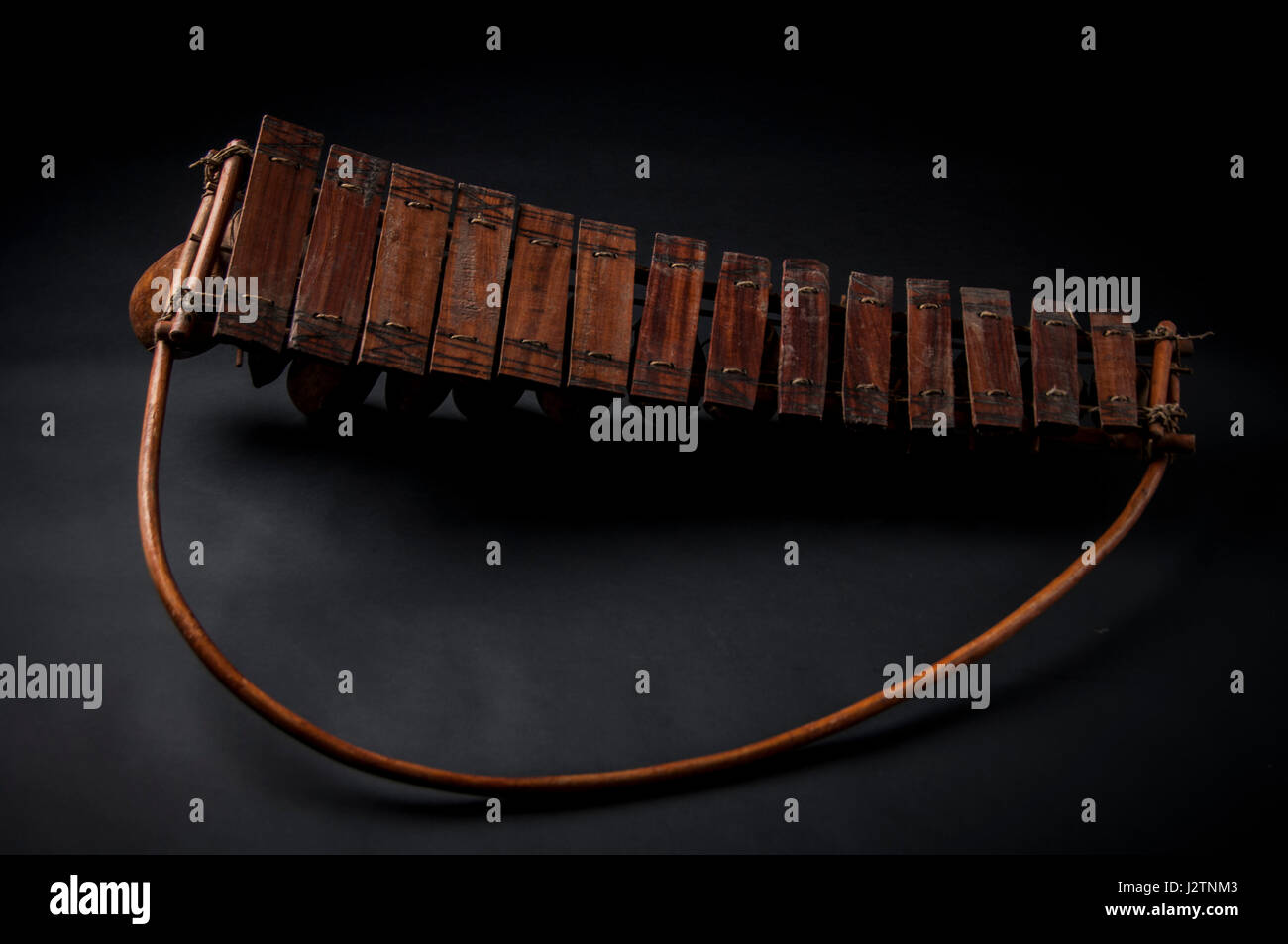 African music instrument, wooden marimba with two bakets, isolated on ...