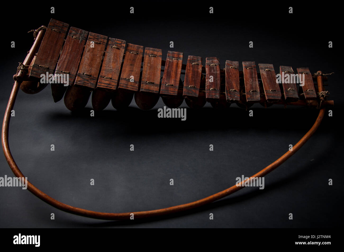 African music instrument, wooden marimba with two bakets, isolated on ...