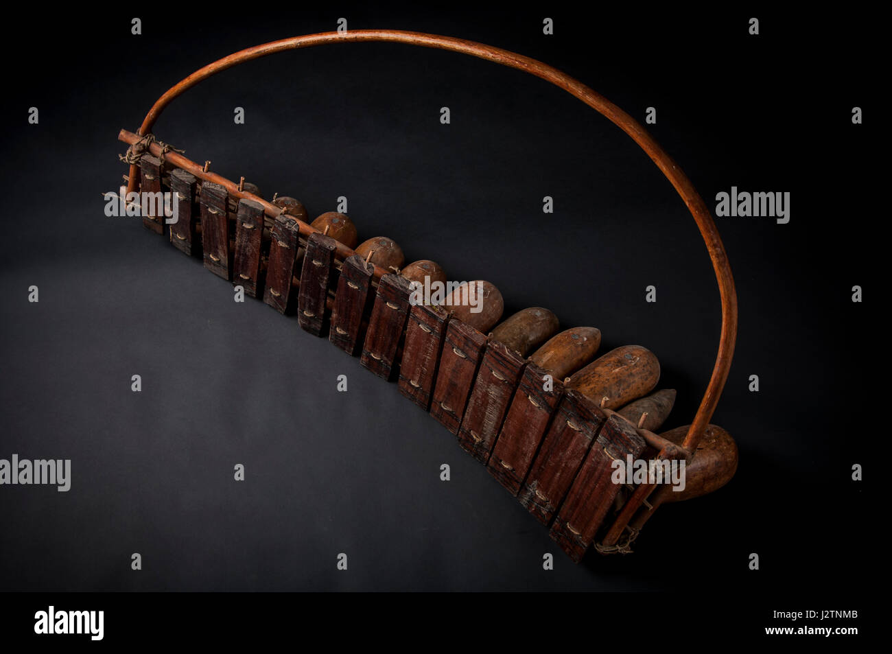 African music instrument, wooden marimba with two bakets, isolated on ...