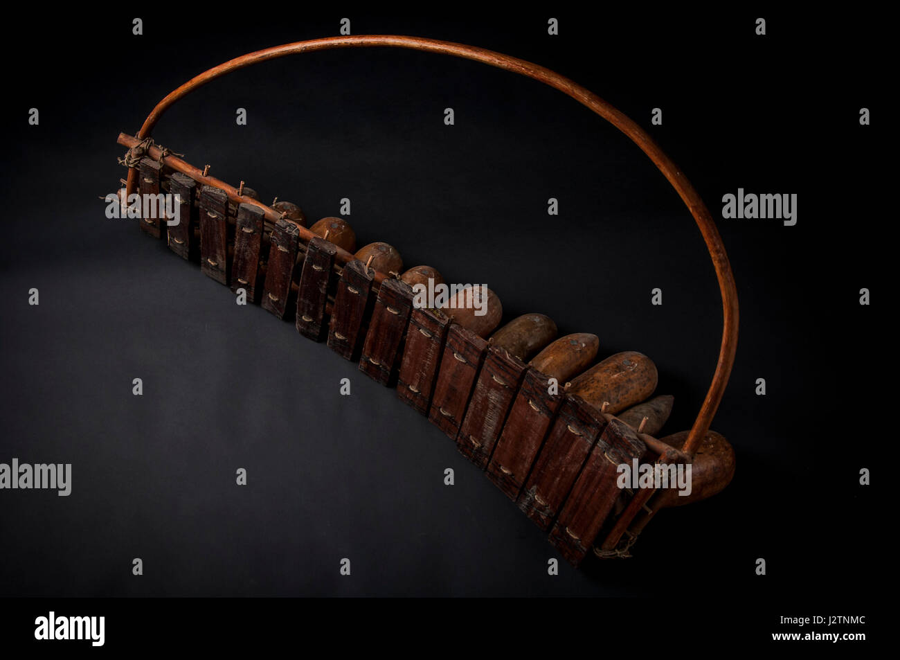 African music instrument, wooden marimba with two bakets, isolated on ...