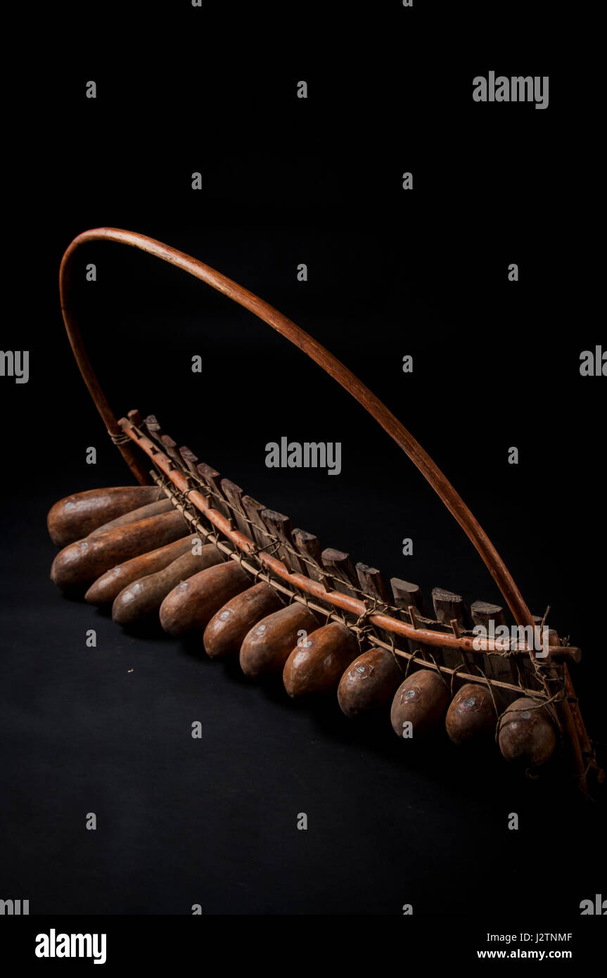African music instrument, wooden marimba with two bakets, isolated on ...