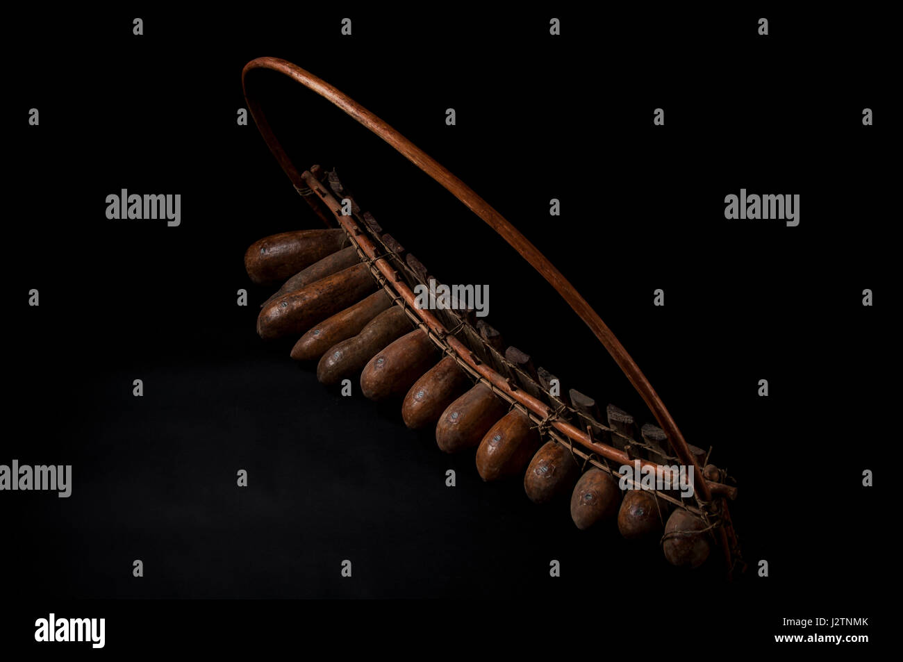 African music instrument, wooden marimba with two bakets, isolated on ...