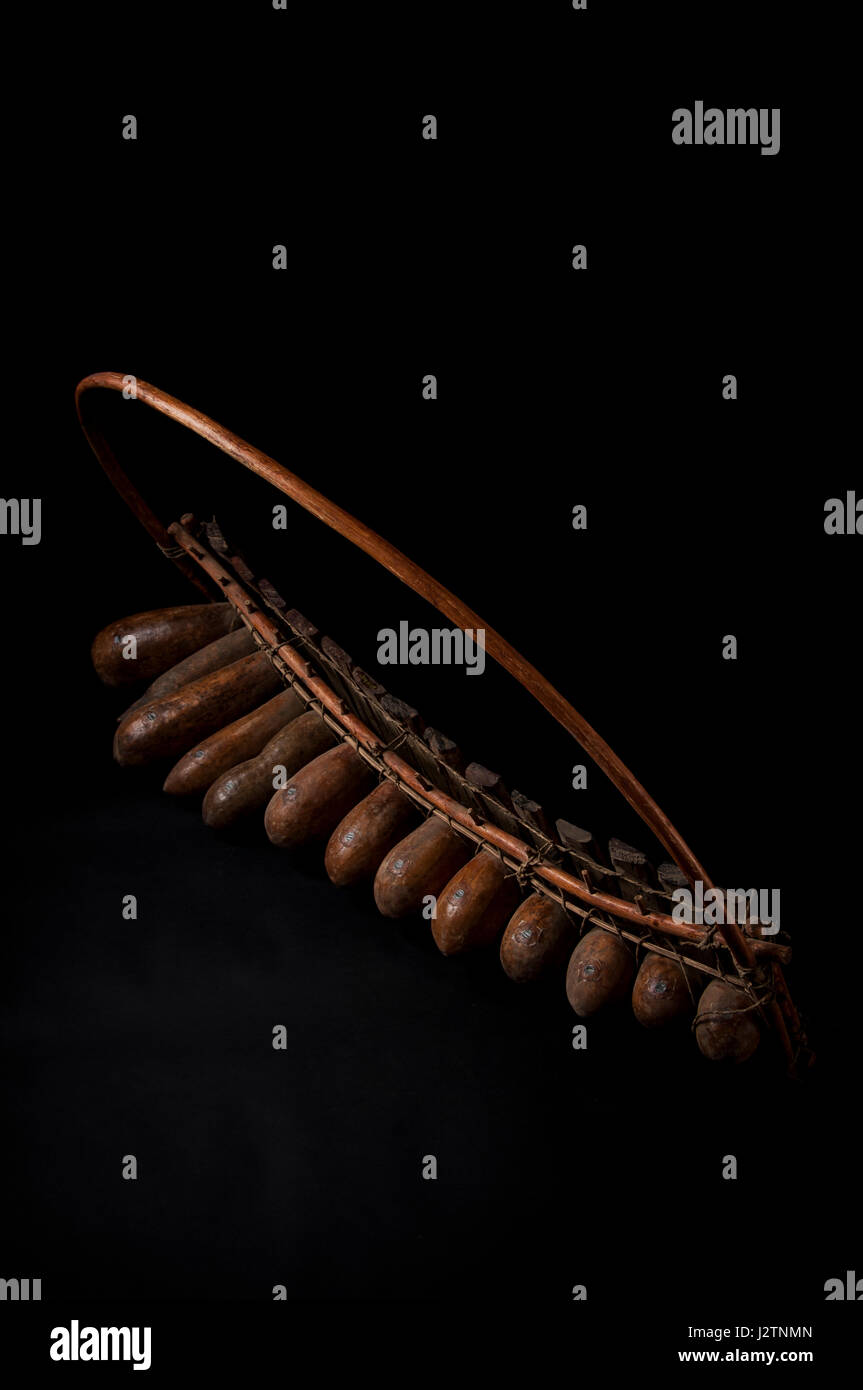 African music instrument, wooden marimba with two bakets, isolated on ...