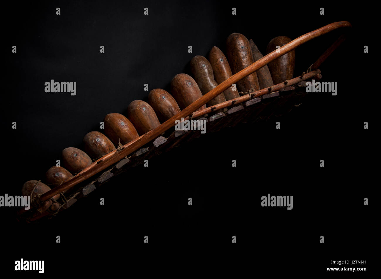 African music instrument, wooden marimba with two bakets, isolated on ...