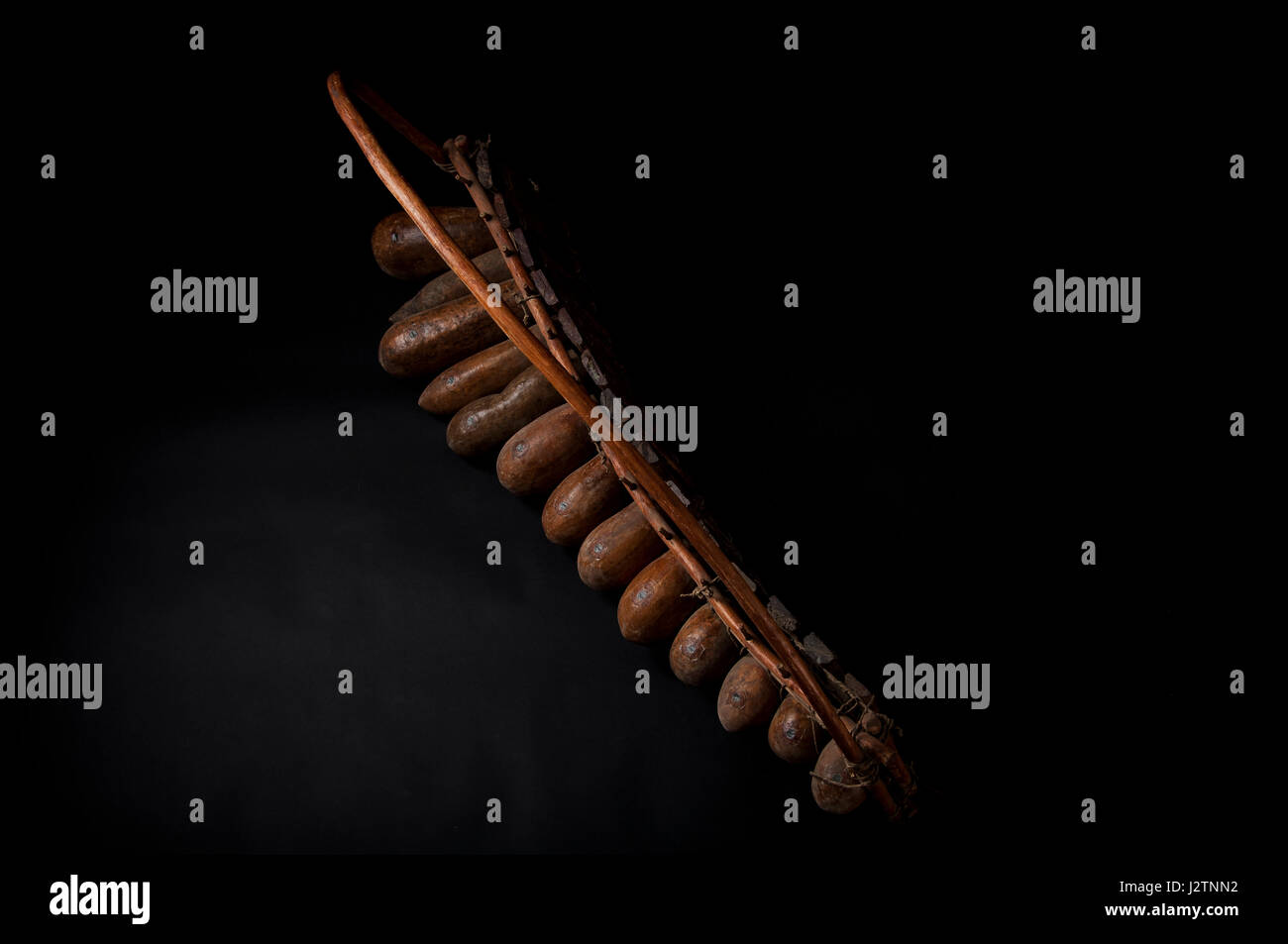 African music instrument, wooden marimba with two bakets, isolated on ...