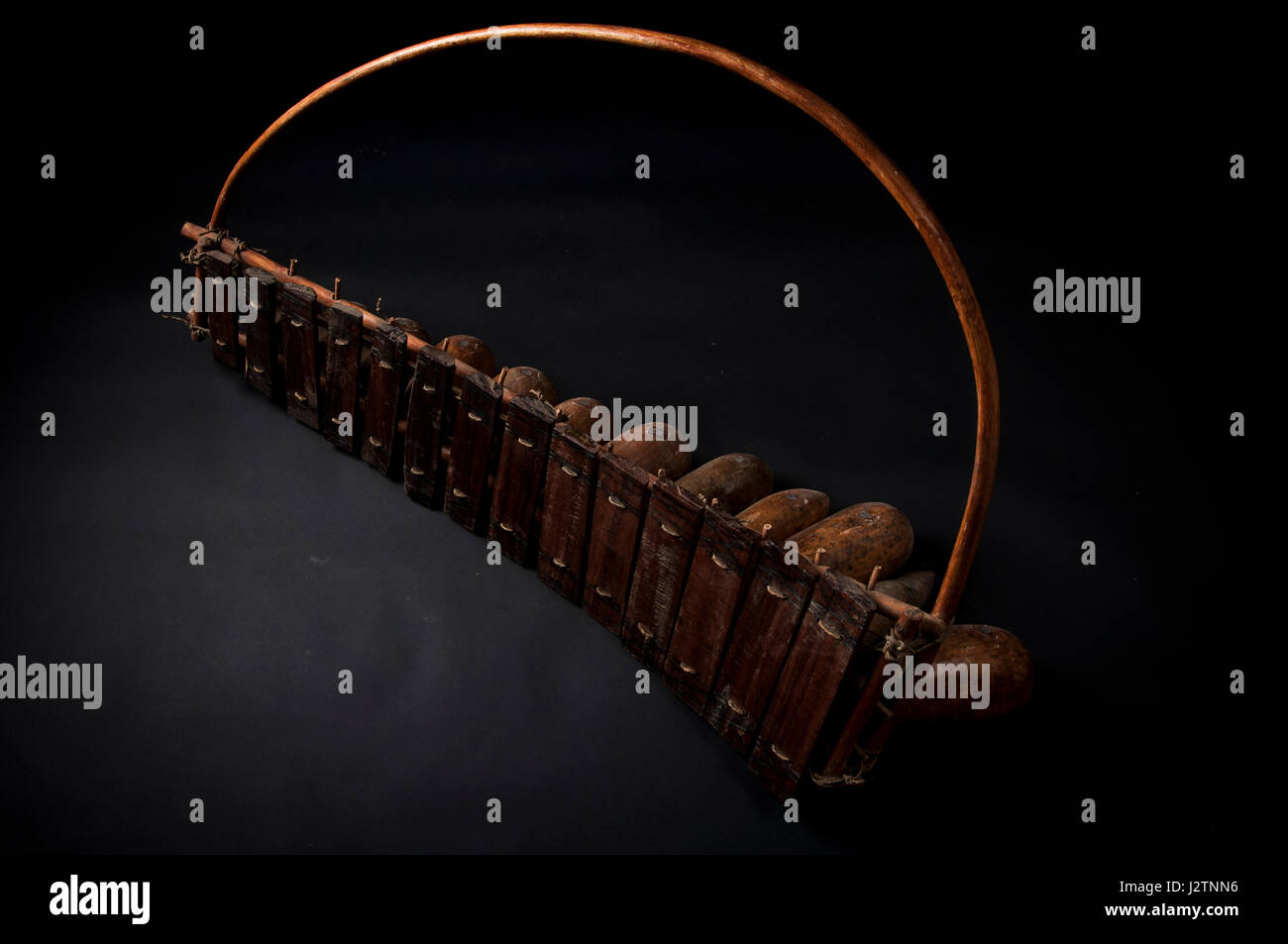 African music instrument, wooden marimba with two bakets, isolated on ...