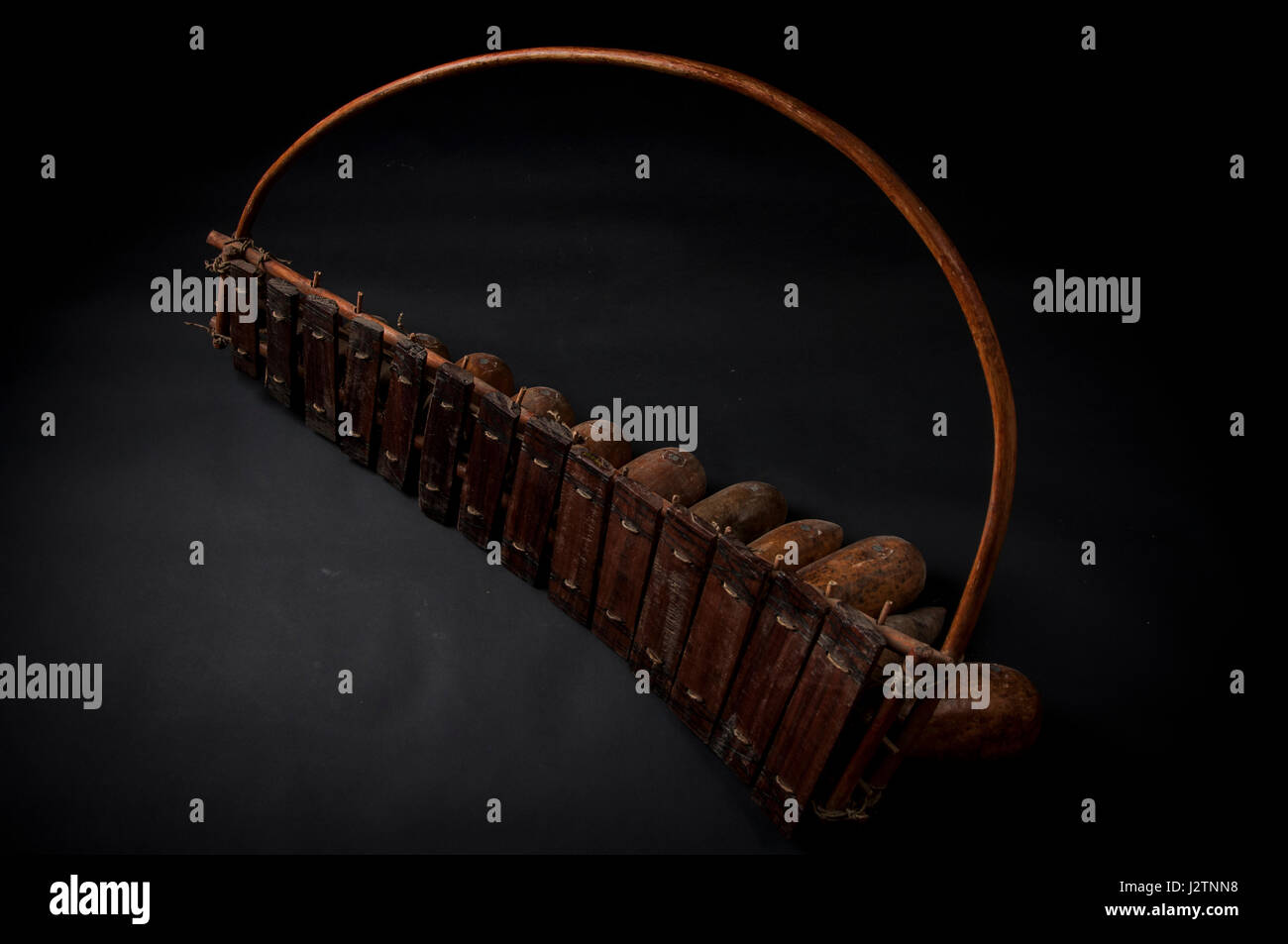 African music instrument, wooden marimba with two bakets, isolated on ...