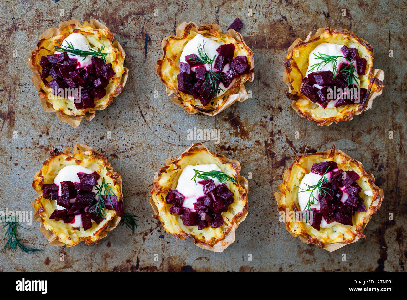 Potato rosti with beetroot and horseradish Stock Photo - Alamy