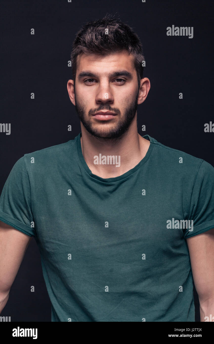 handsome man portrait, front view, upper body shot, green t-shirt ...