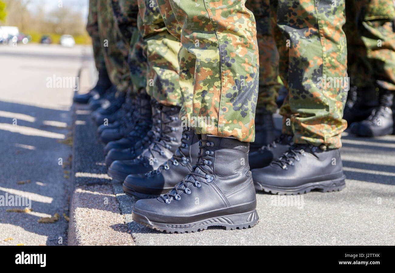 german army shoes in a line Stock Photo - Alamy