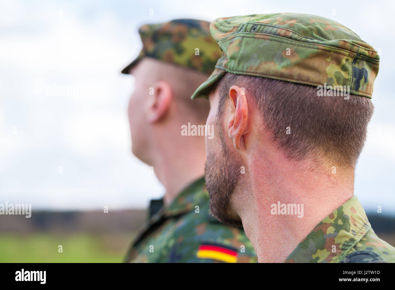 two german soldiers looks to the side Stock Photo - Alamy