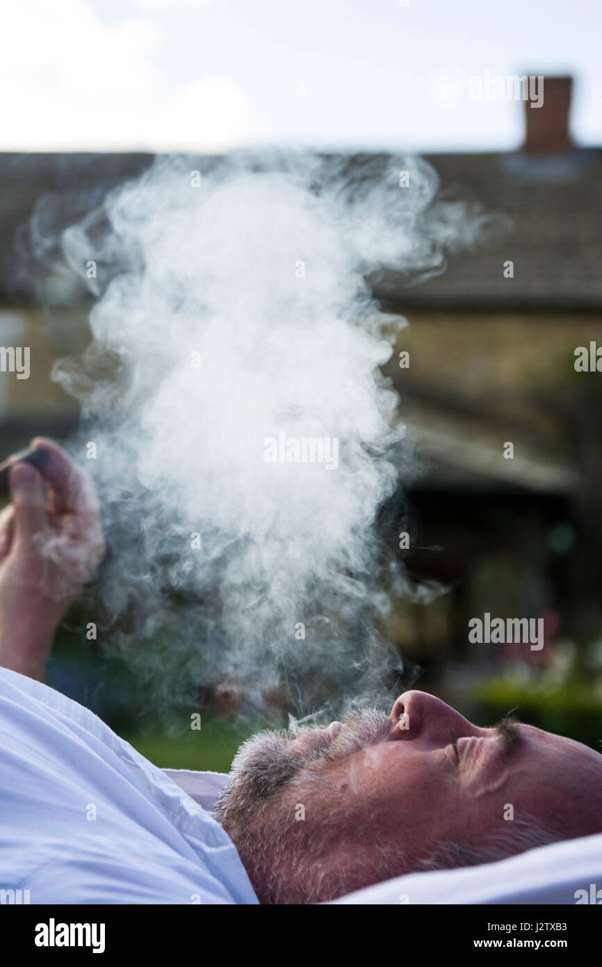 Middle Aged Man Smoking Cigarettes Stock Photos & Middle Aged Man ...