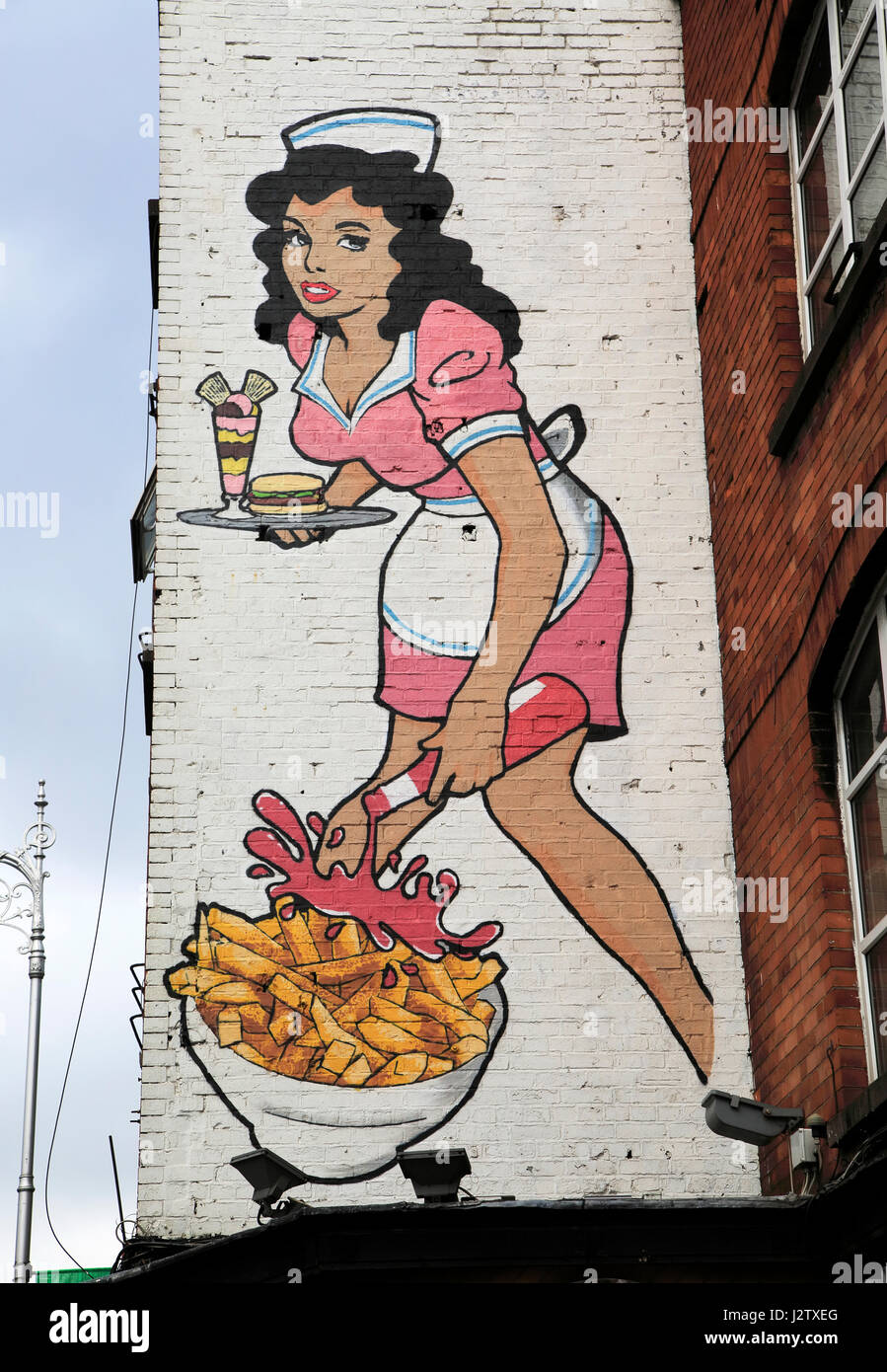 Wall painting mural woman waitress wearing apron pouring tomato ketchup ...