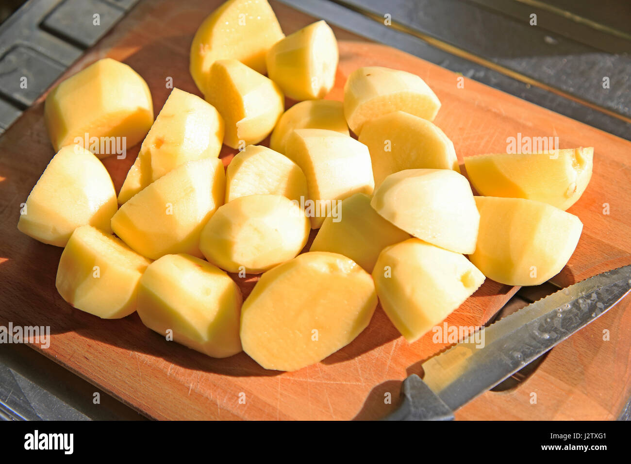 Peeled potato halves hi-res stock photography and images - Alamy