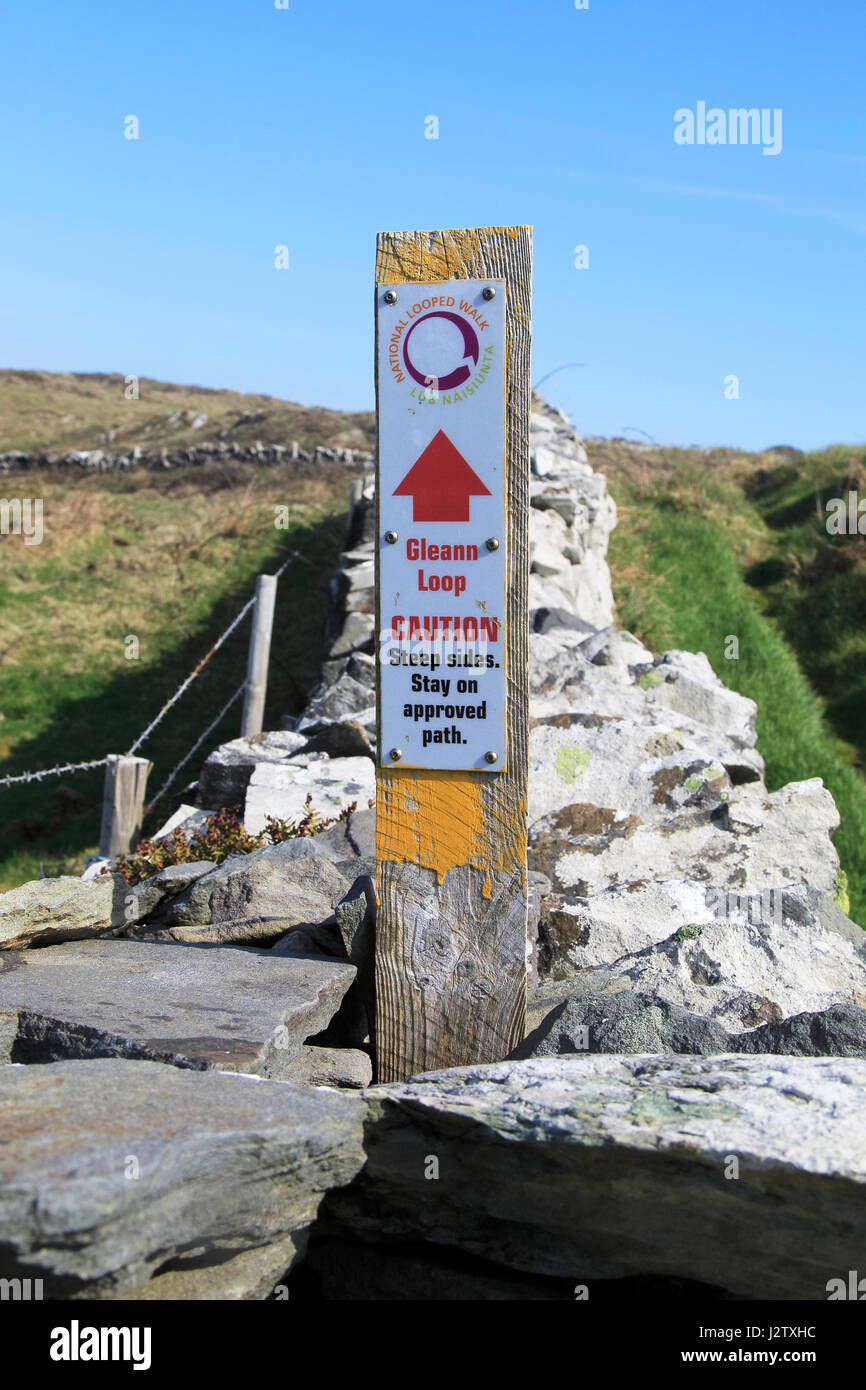 Coastal footpath and sign on cliff path, Cape Clear Island, County Cork ...