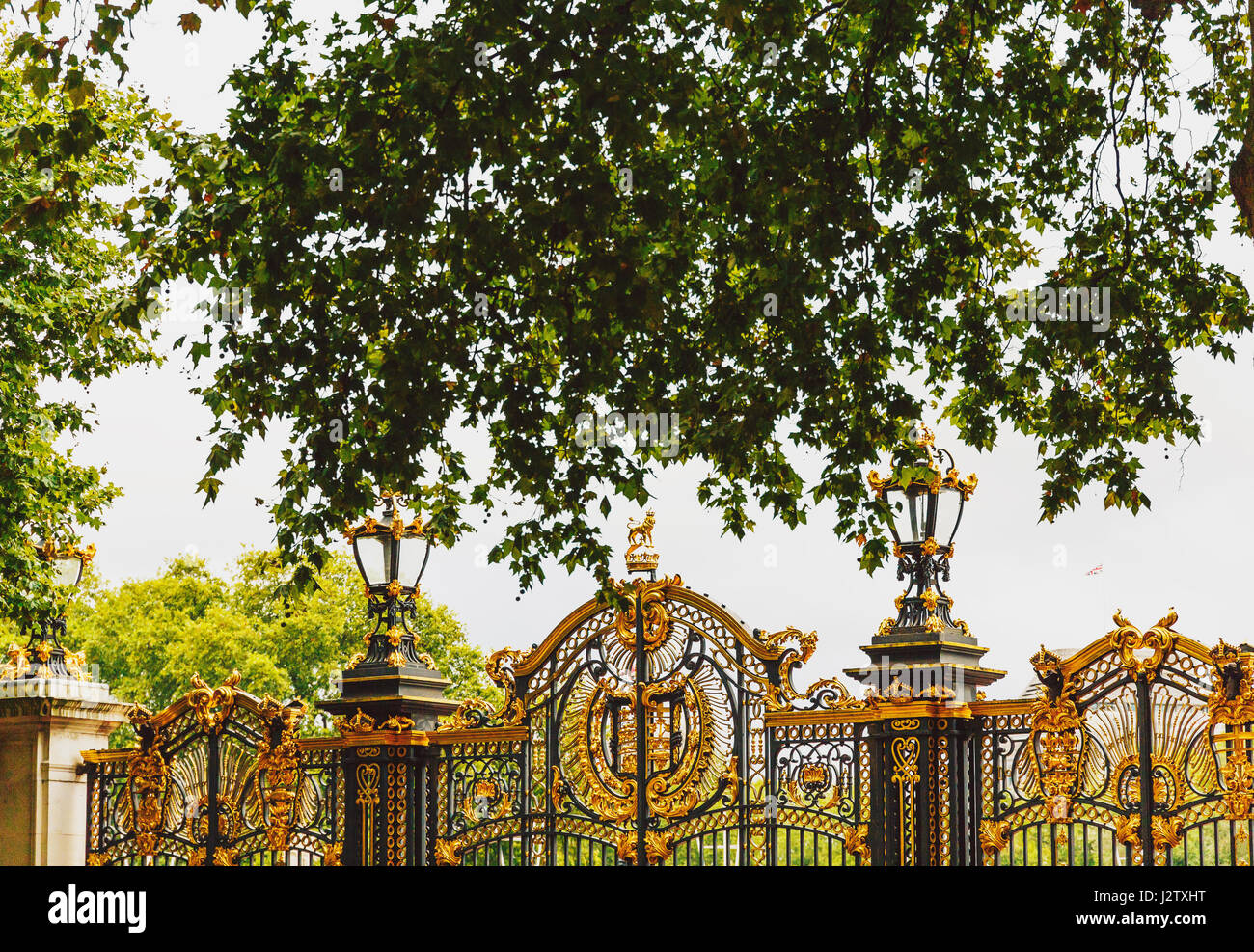 LONDON, UNITED KINGDOM - August 20, 2015: Beautiful gates with golden ...