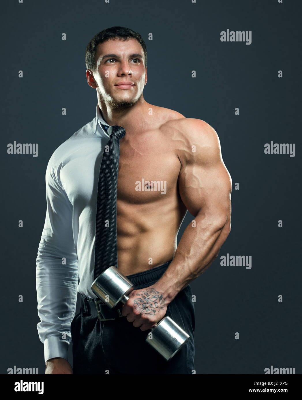 Athlete businessman showing his internal strength. Sports Stock Photo ...