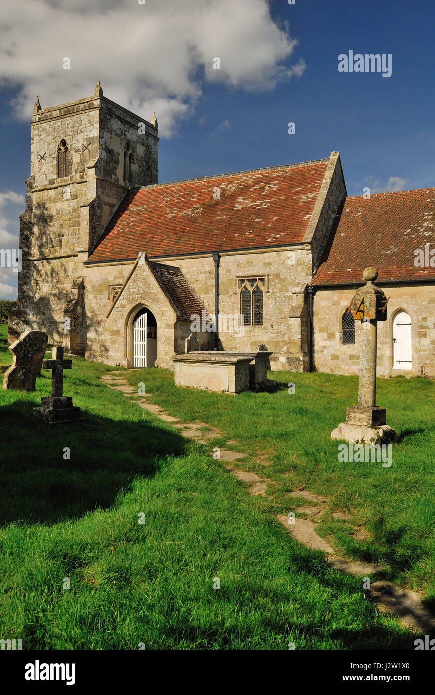 All Saints church, Sutton Mandeville, and sundial pillar Stock Photo ...