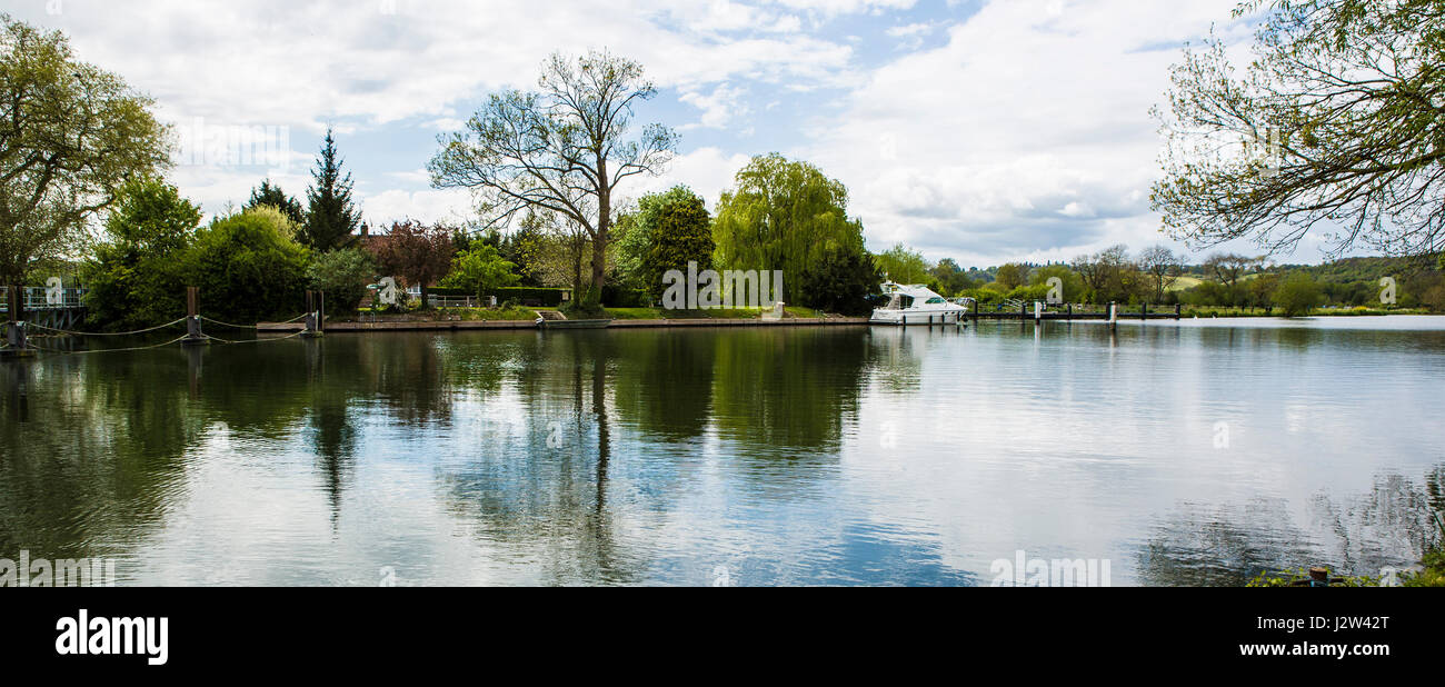 SWINDON, UK - MAY 1, 2017: Boat on the River Thames at Mapledurham Lock ...