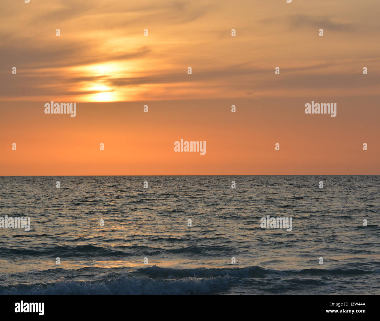 A beautiful sunset over the Gulf of Mexico on Indian Rocks Beach ...