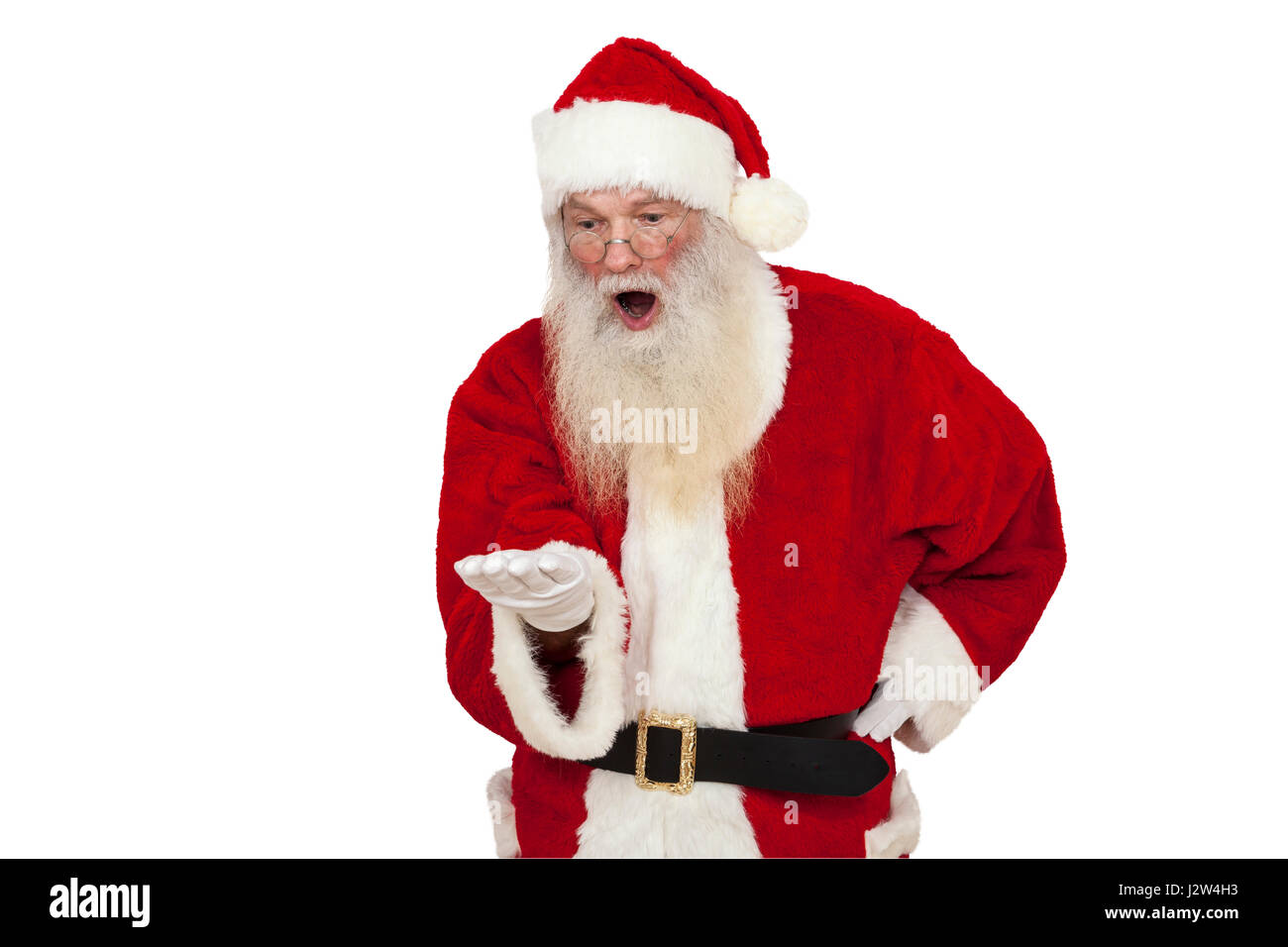 Santa Claus looking amazed on his hand Stock Photo - Alamy