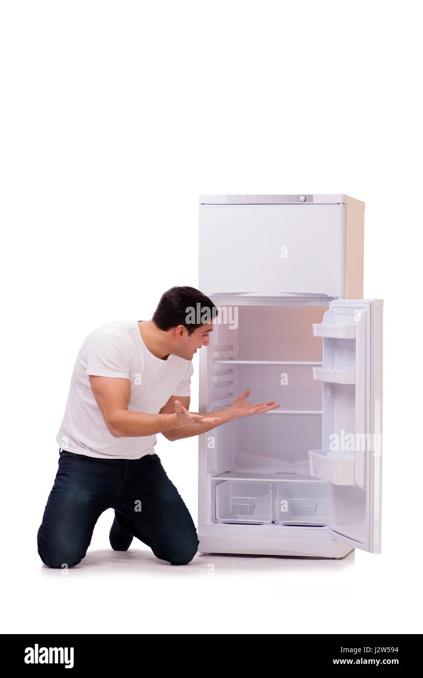 Man looking for food in empty fridge Stock Photo - Alamy
