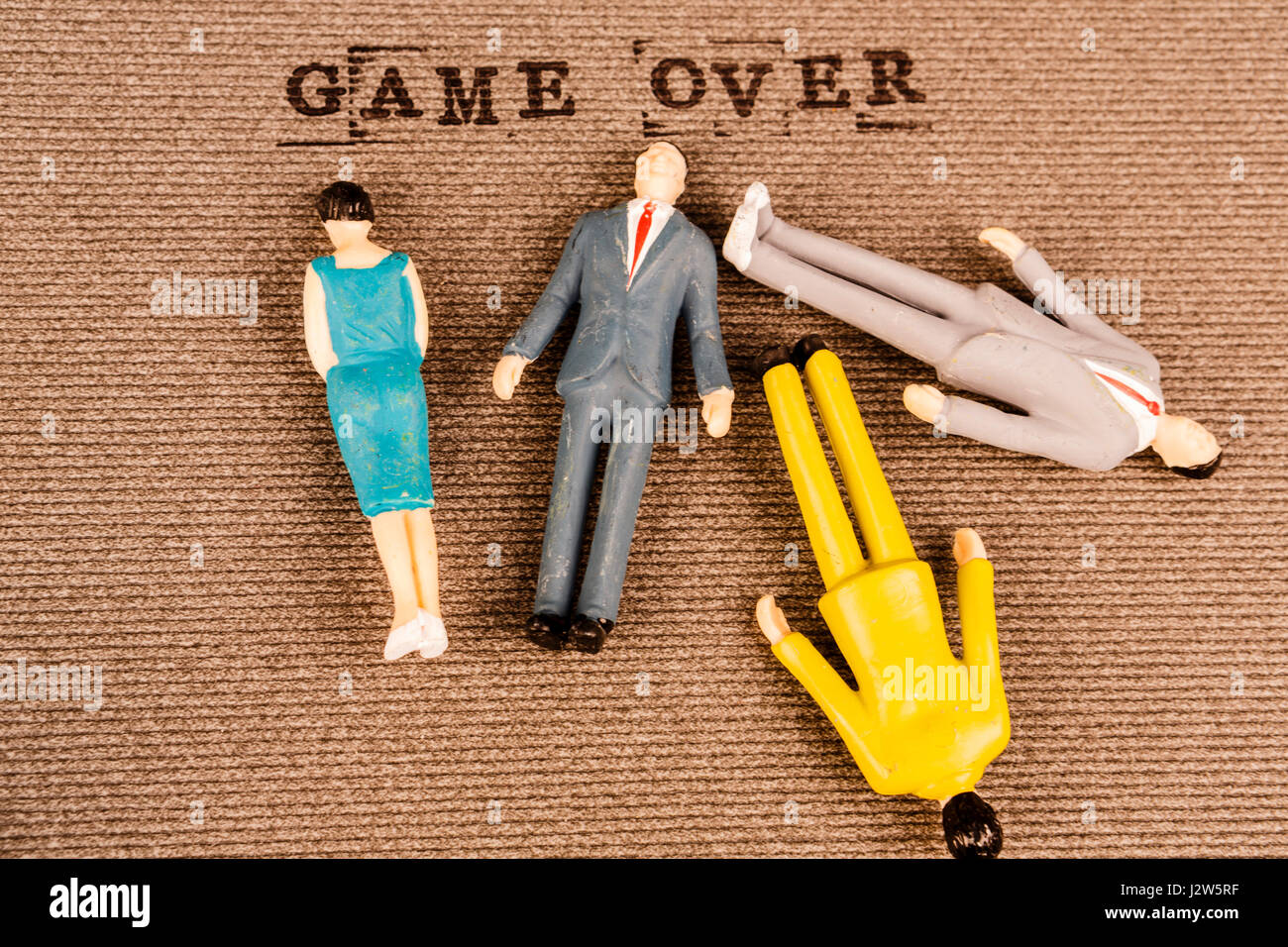 text game over with human bodies of mans and womans - death concept ...