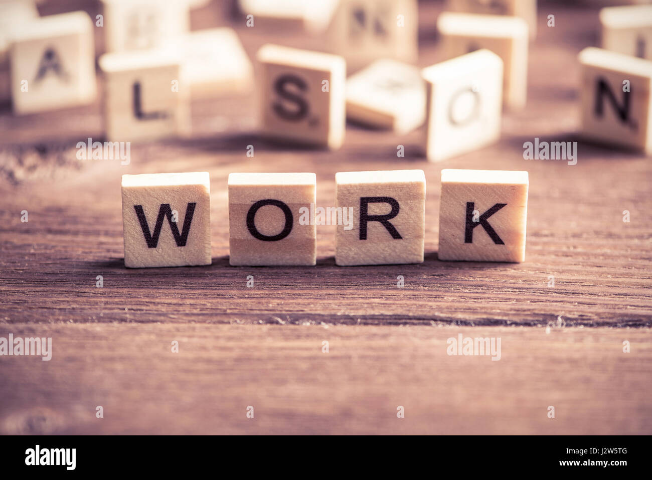 wooden elements with word work Stock Photo - Alamy