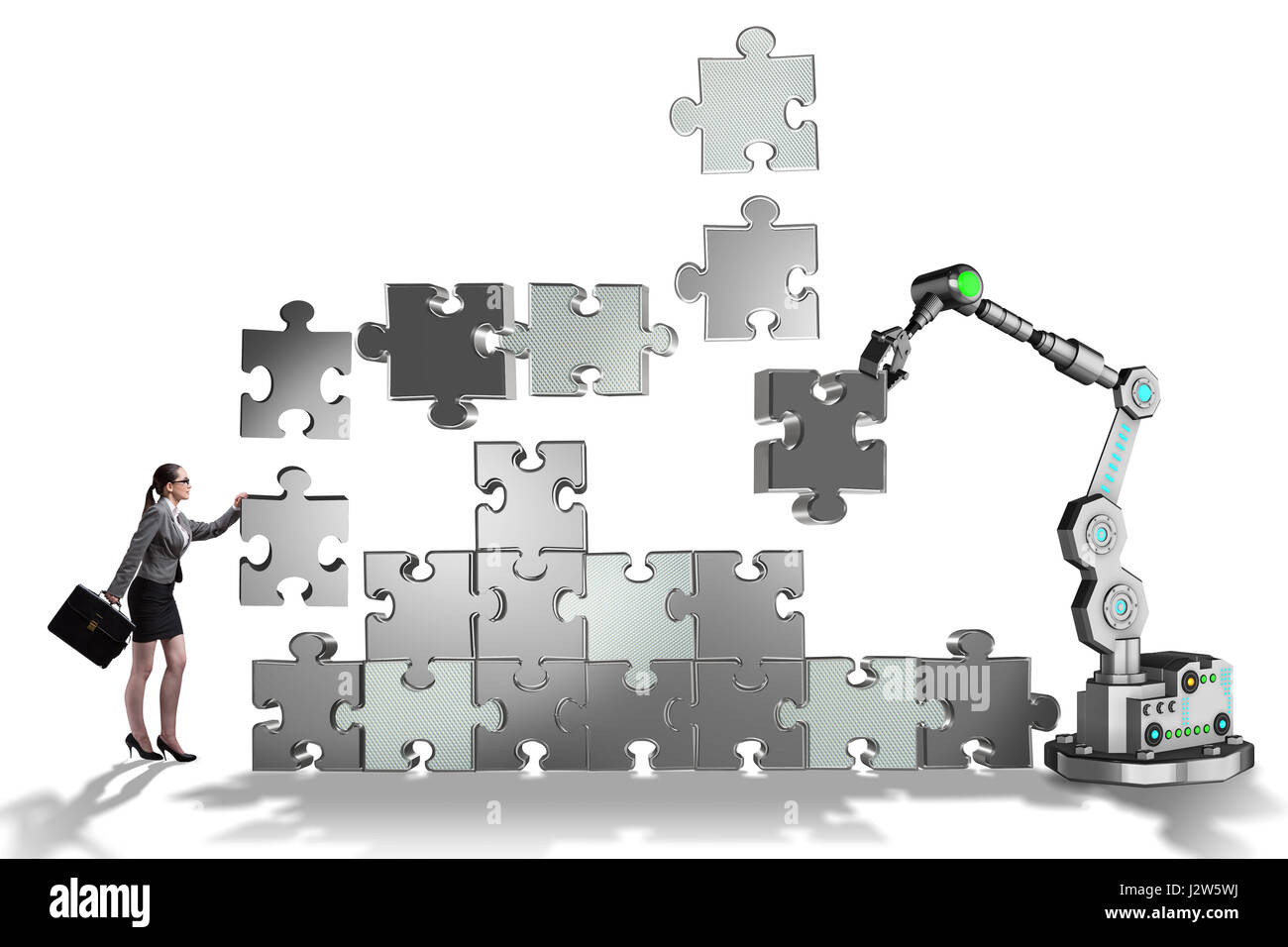 Businesswoman doing jigsaw puzzle with robotic arm Stock Photo - Alamy