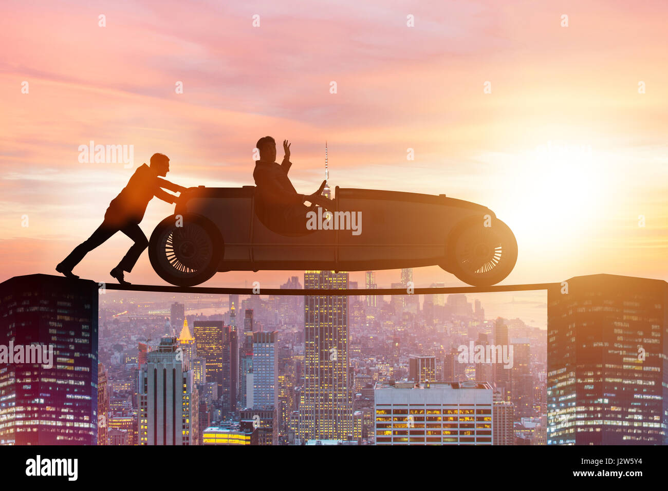 Teamwork concept with businessman pushing car Stock Photo - Alamy