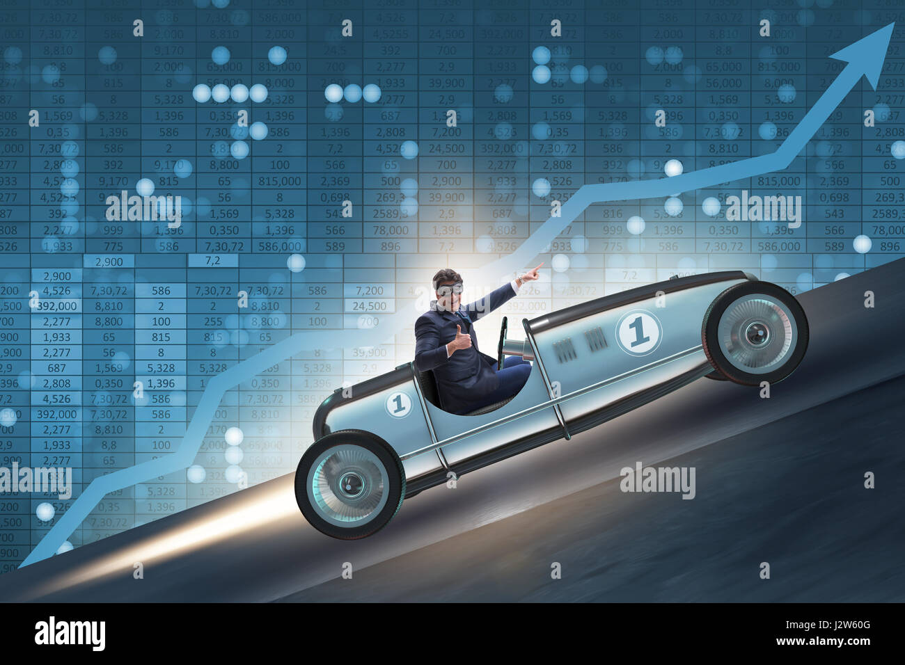Businessman riding sports car against charts Stock Photo - Alamy
