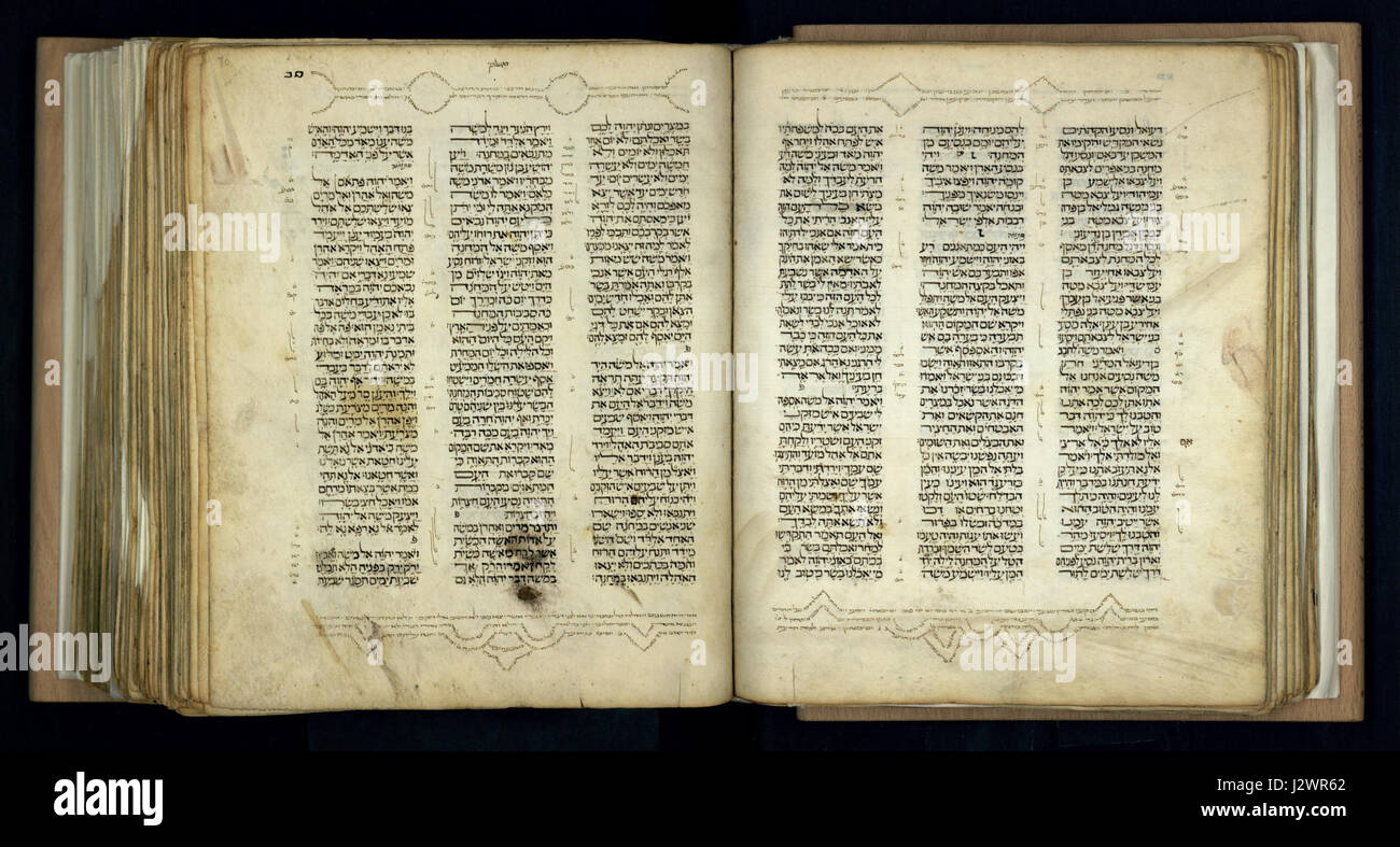 This 1300 AD manuscript is a Bible featuring early medieval script and ...