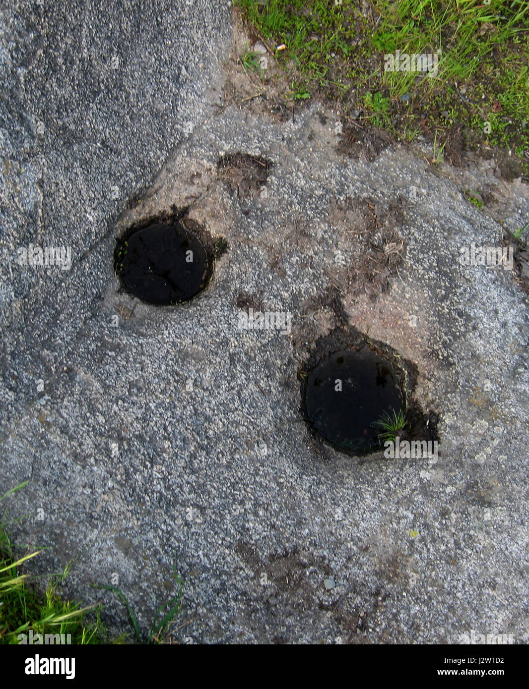 Acorn mortar holes friant ca Stock Photo - Alamy