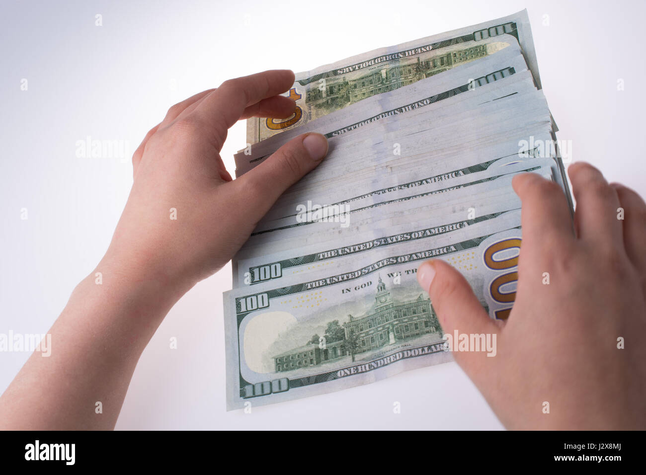 Human hand holding American dollar bill as money isolated on white ...