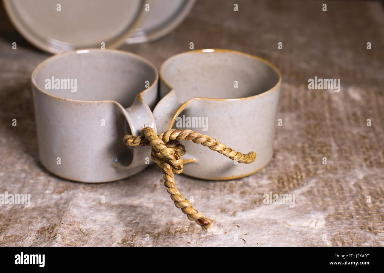 Two cups in the style of the old modernist linked site coarse rope ...