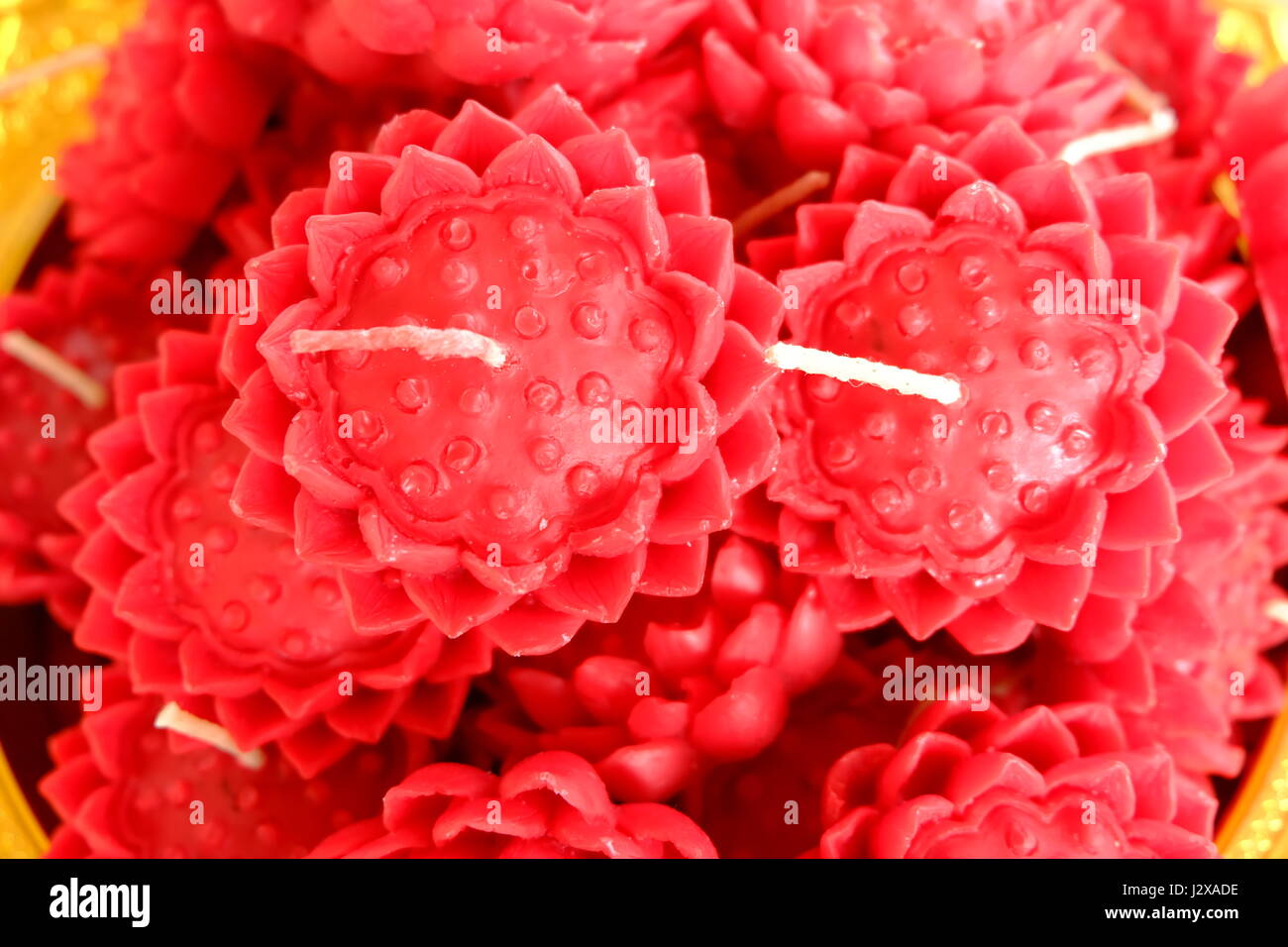Red flower candles hi-res stock photography and images - Alamy