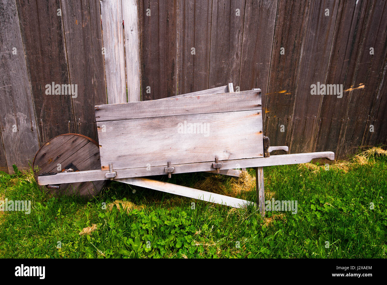 Old Wooden Wheelbarrow High Resolution Stock Photography and Images - Alamy