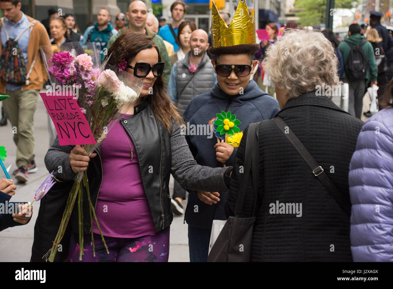 New York City, USA. 30th Apr, 2017. Love Day attendees parade along ...
