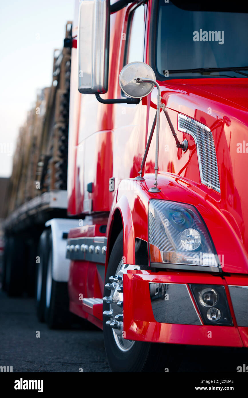 Beautiful modern and stylish semi truck trailer loaded with pipes with ...