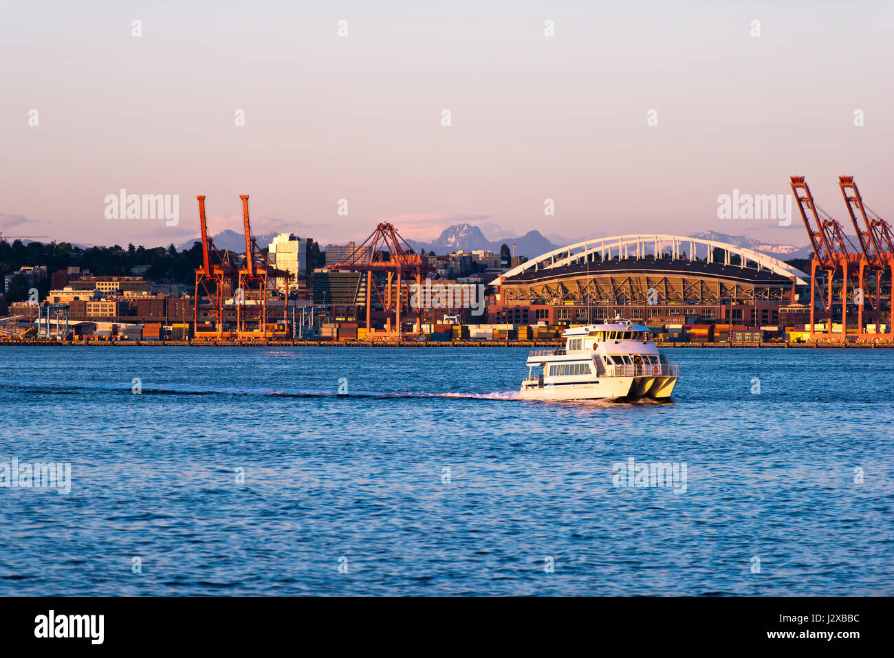 Passenger boat catamaran with several decks and cabins in the bay on ...