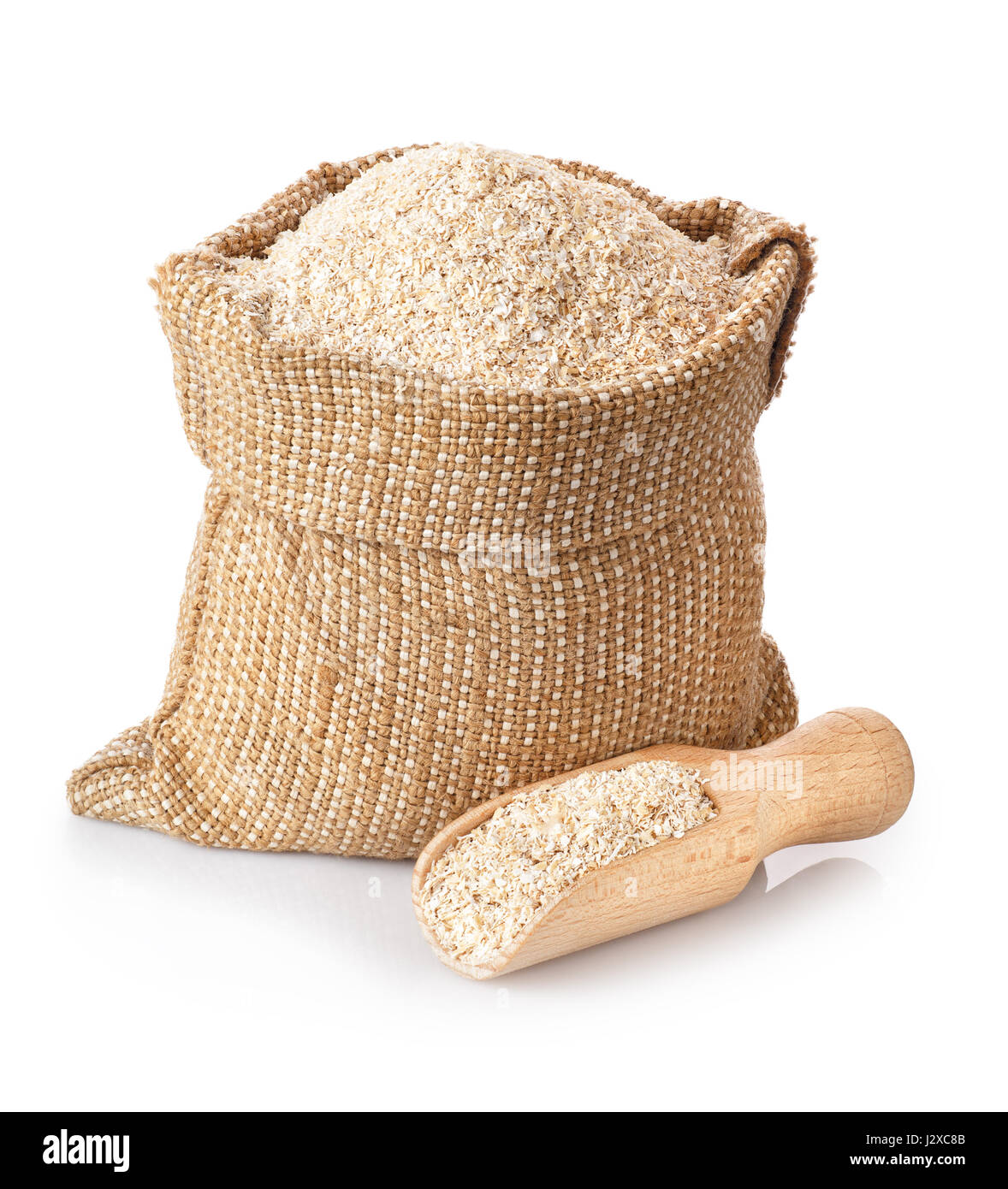 bran in sack and wooden scoop isolated on white background. Food ...