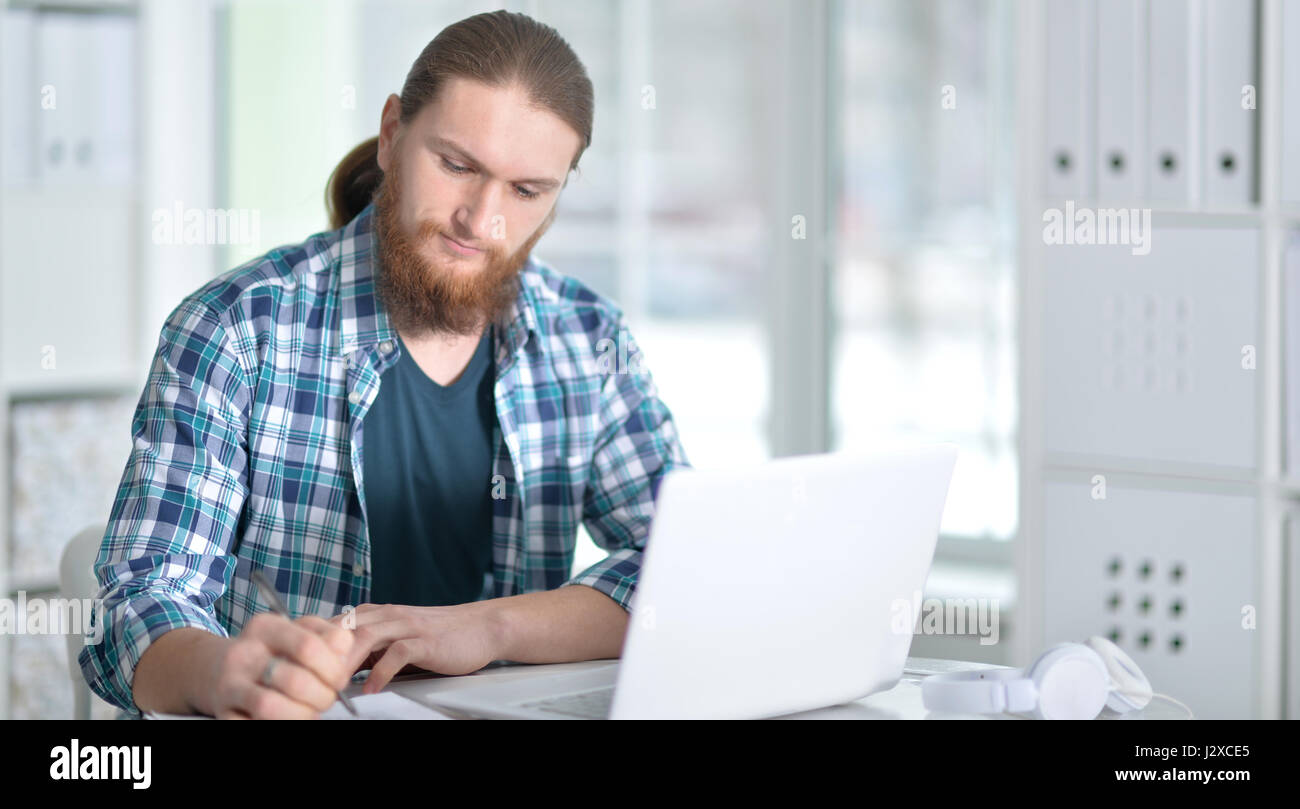 Attractive serious business man working hi-res stock photography and ...