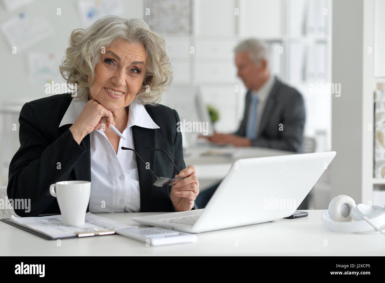 Team of older businessmen working Stock Photo - Alamy