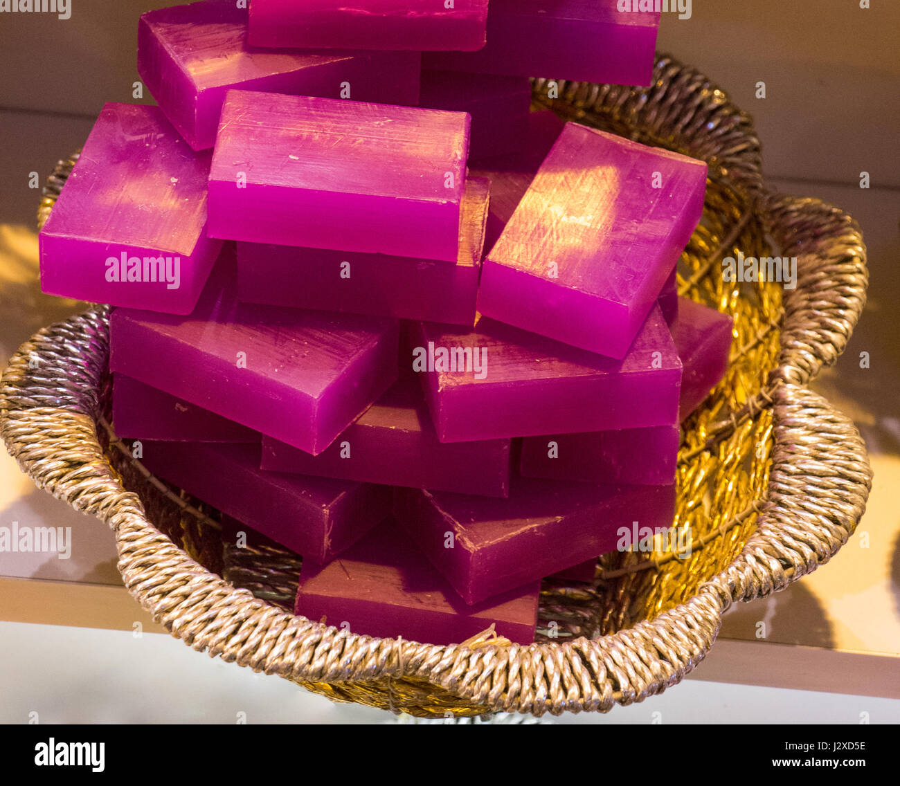 Collection of bars of fragrant hand made organic soap in a basket Stock ...