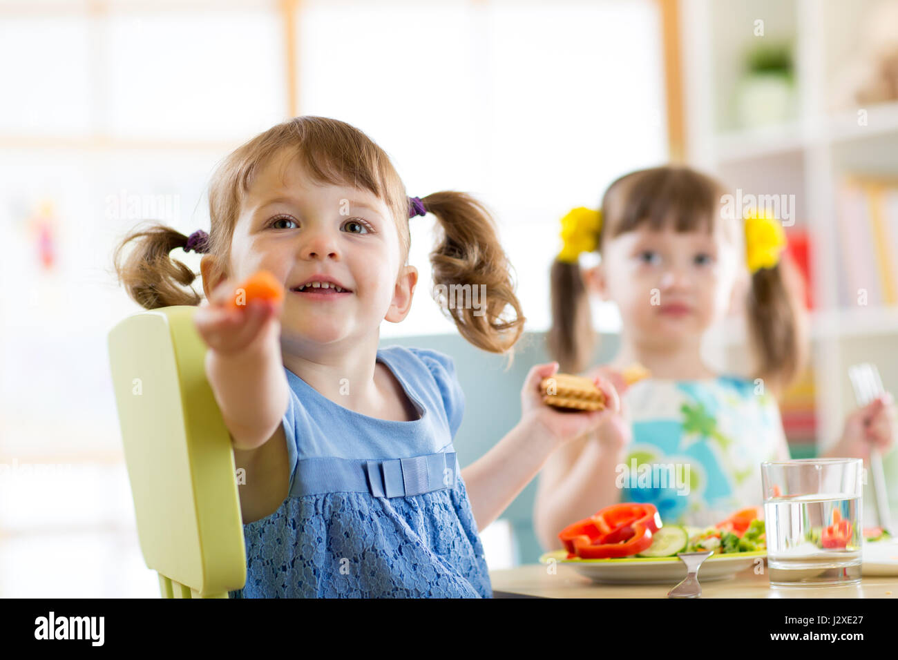 kids eating healthy food in kindergarten or at home Stock Photo - Alamy