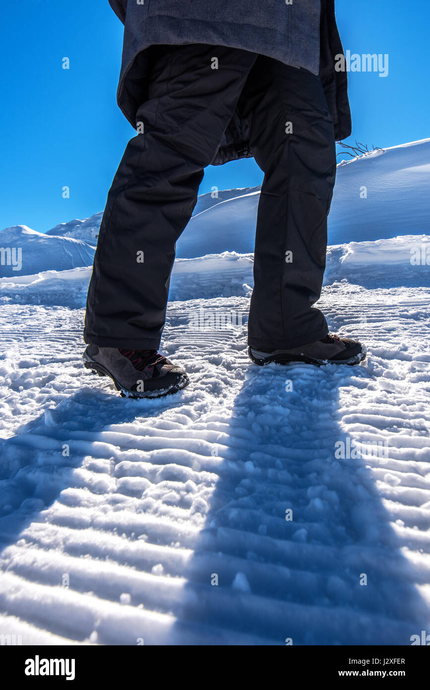 Walking on snowy path hi-res stock photography and images - Alamy