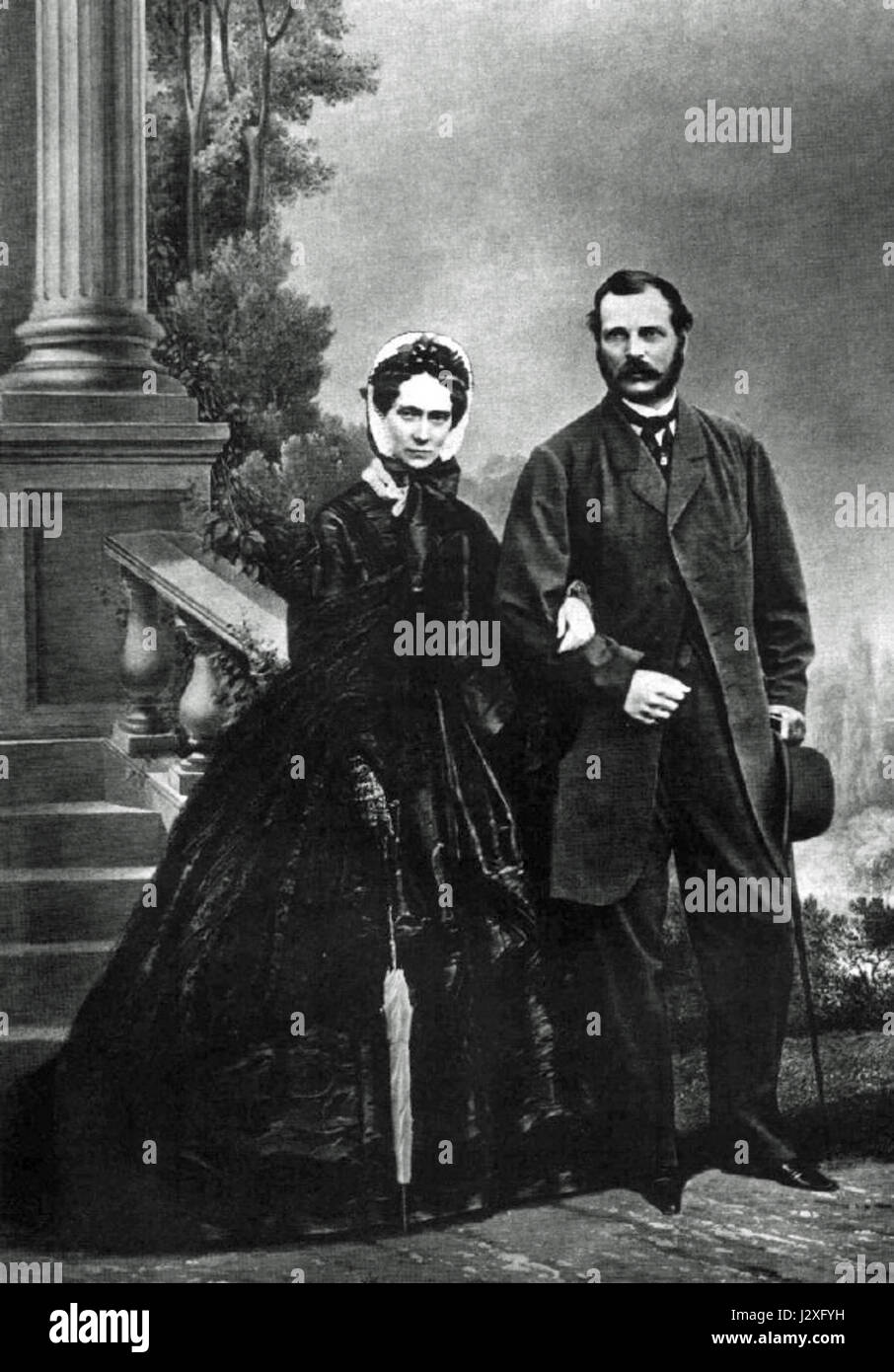 The photograph likely depicts Tsar Alexander II of Russia with his wife ...