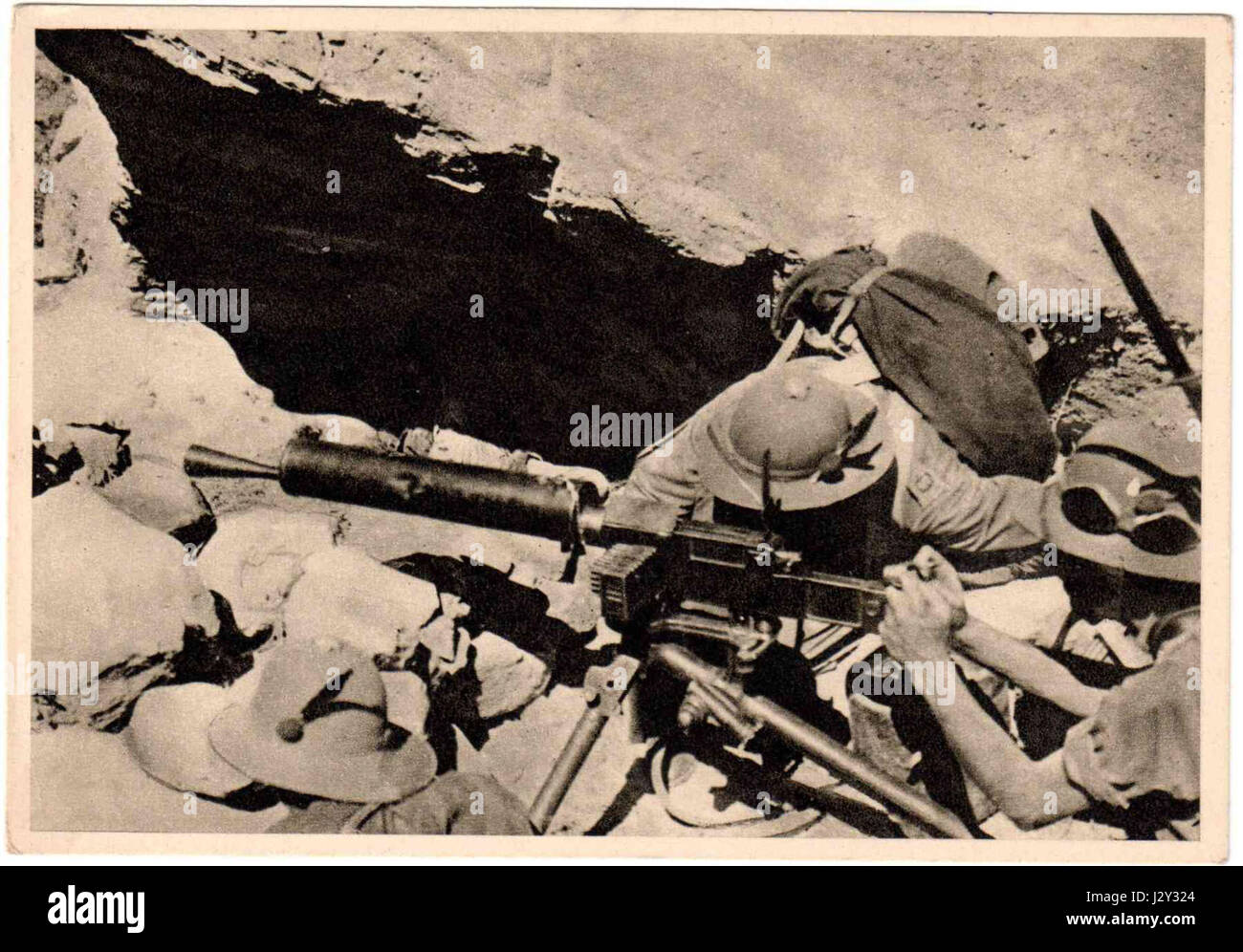 A historical photograph capturing Italian soldiers (Alpini) during the ...
